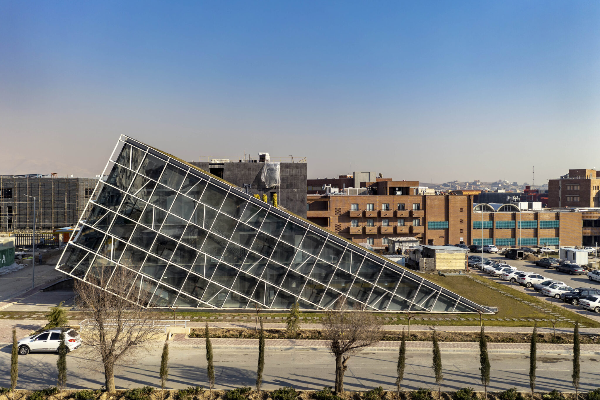Commendable Commerce: 5 Sculptural Business Buildings Captured in Plan ...